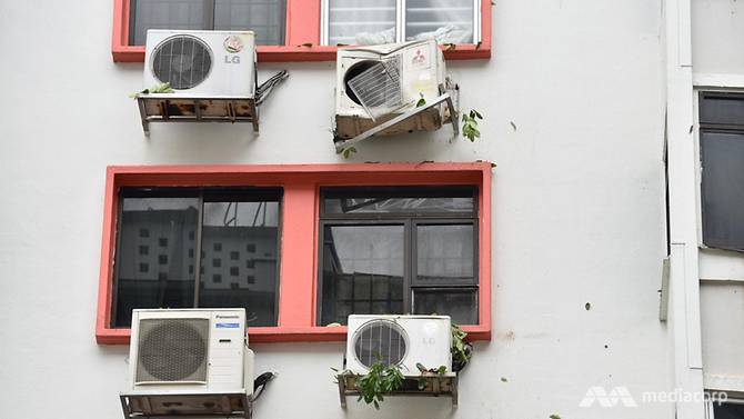 Windows smashed, air conditioners damaged after fallen tree hit HDB ...